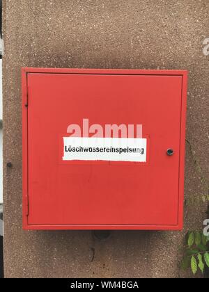 Fire hose box on a container ship's deck Stock Photo - Alamy