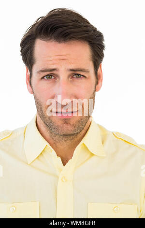 portrait of mid adult man with dumbfounded look on his face against ...