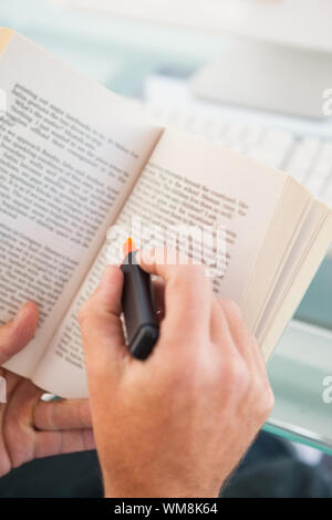 Man Hand With Highlighter Reading Book Stock Photo - Alamy