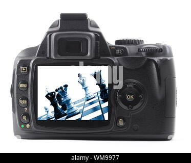 digital camera and chess pieces isolated on white background Stock ...