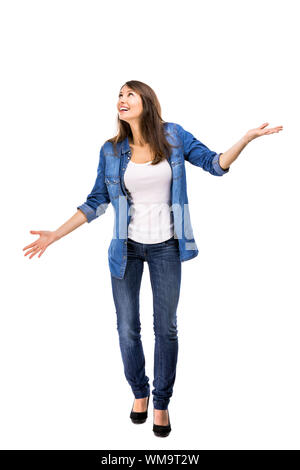 Happy woman trying to catch something falling from the sky Stock Photo ...