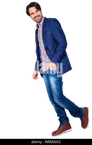 Trendy man in checkered jacket looking at camera while touching ...