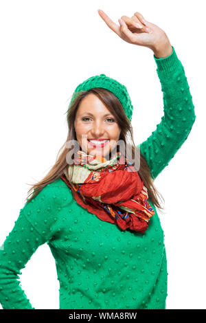Excited exuberant pretty young woman cheering and smiling and raising ...