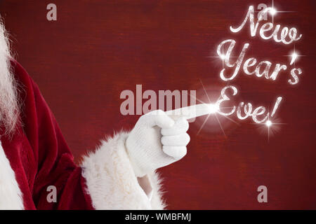 Santa Claus points at something against green snowflake background ...