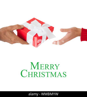 Couple passing a wrapped gift against screen collage showing lifestyle ...