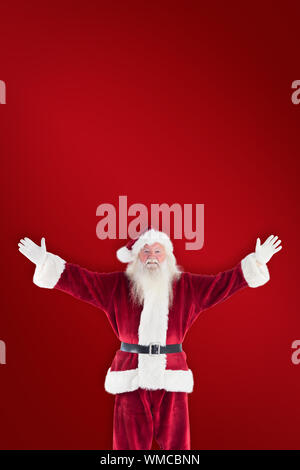 Jolly Santa opens his arms to camera against red background Stock Photo ...