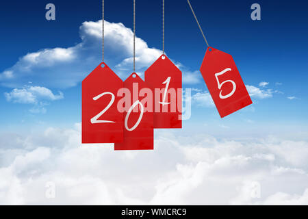 2015 red tags against bright blue sky over clouds Stock Photo - Alamy