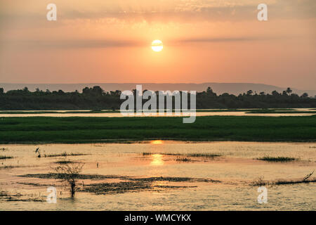 A beautiful sunset over the Nile River in Cairo, Egypt, captured in ...
