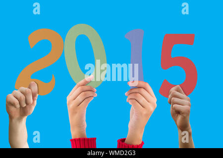 Hands holding poster against blue background with vignette Stock Photo ...