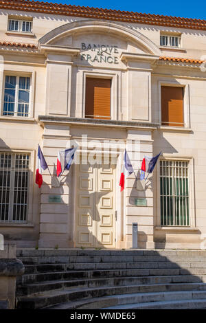 Façade of Banque de France buildings in Paris flying the Tricolour ...