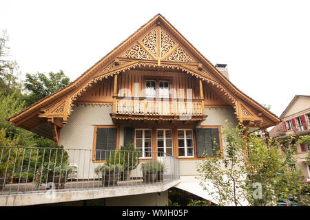 Carved wooden window with lattice work in the traditional Nepalese ...