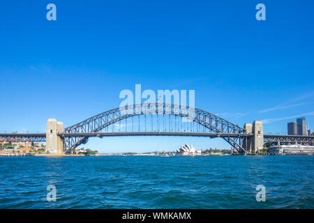 Sydney harbour bridge against a blue sky Stock Photo - Alamy