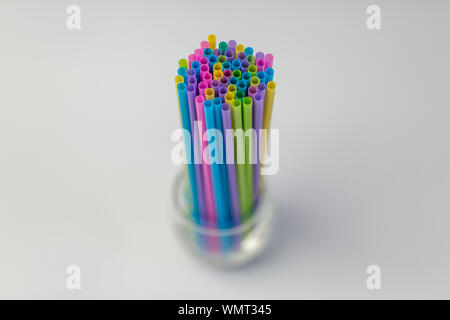 Colorful drinking straws in glass of water Stock Photo - Alamy