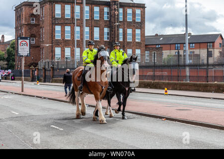 Police Scotland mounted officers on patrol during the 2014 Edinburgh ...