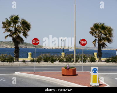 MALTA road sign against clear blue sky Stock Photo - Alamy