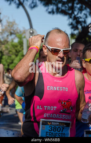 Runner during the Marathon 2014 in Barcelona, Spain Stock Photo - Alamy