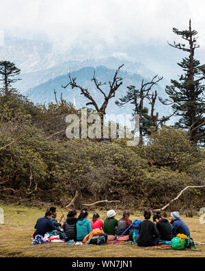 Group of people resting on the mountain top, by E R Ober Stock Photo ...