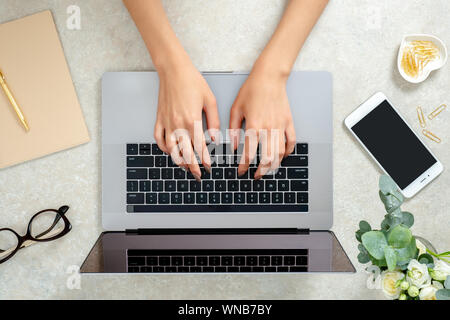 Female blog writer workspace concept. Green monstera palm leaves ...