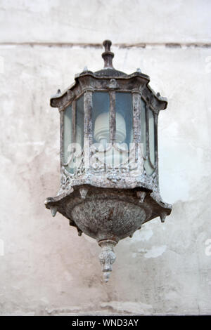 The texture of a stone wall. Sconce and Stone wall as background or ...