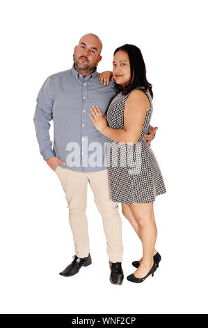 Middle age hispanic couple smiling happy training yoga at sport center ...