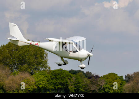 Flight Design CT2K G-CBDJ in flight at Breighton Airfield Stock Photo ...