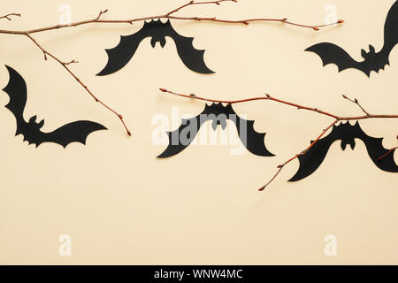 Halloween paper decorations on pastel pink background. Halloween ...