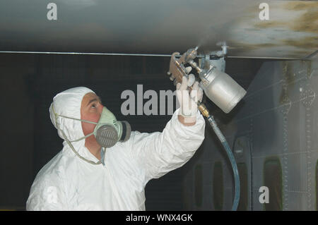 Airplane wing, spray painting Stock Photo - Alamy