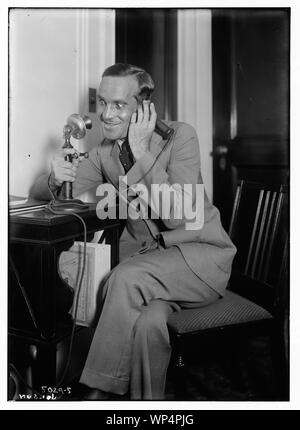 Al Jolson, a famous American singer and actor, is pictured with his son ...