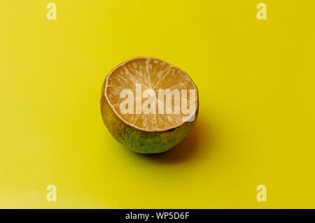 Rotten lime with mold. Spoiled citrus packaging Stock Photo - Alamy
