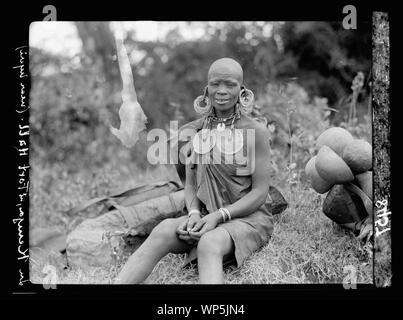 Kenya Colony. Fort Hall. Old woman with typical decorations. 1936 ...