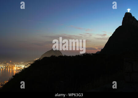 Beautiful orange sunset with mountains and Christ the Redeemer Stock ...