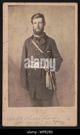 Lieutenant Henry B. Thompson of Co. D, 77th Pennsylvania Infantry Regiment in uniform with sword ...