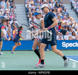 Bethanie Mattek-Sands and Jamie Murray shake hands with Austin Krajicek and Jessica Pegula at ...