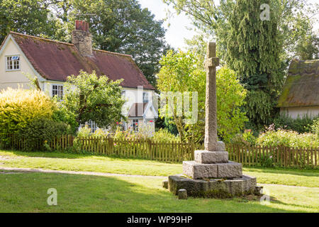 The village green and thatched cottages at Earl Soham, Suffolk, England ...
