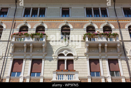 TRIESTE, Italy - June 21, 2019: Richly decorated exterior facade of an ...