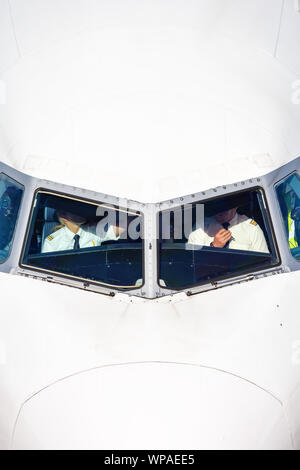 Lufthansa pilot and first officer in the cockpit of the Boeing 747-8 ...