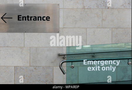 Emergency exit sign and instructions on outside of old passenger ...