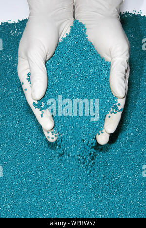 Chemistry checking polymer granulate in laboratory Stock Photo - Alamy
