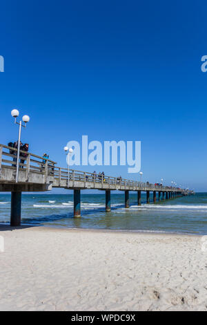 People walking the Seebrucke sea bridge in Binz on Rugen island ...