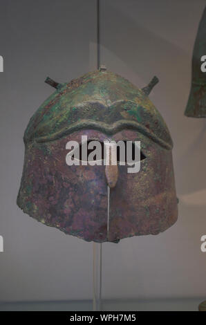 Apulo-Corinthian helmet. Bronze. 400-350 BC. From Ruvo, Apulia. British ...