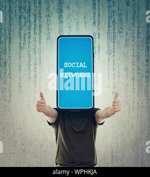 Mass media addiction and propaganda. Mobile phone connected with hand ...