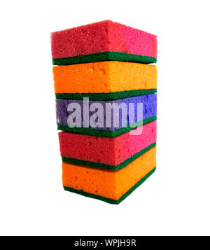 A stack of colored kitchen sponges isolated against white background ...