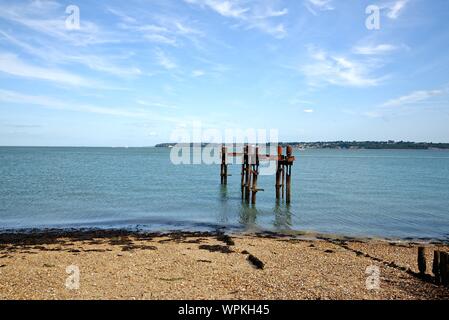 The remains of a D-Day pier, known as the Dolphins, stand in the Solent ...