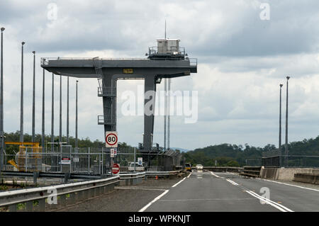 The Wivenhoe Dam with a concrete spillway across the Lake Wivenhoe, and ...