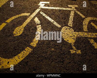 Bicycle lane with yellow marking on the ground in Switzerland Stock ...