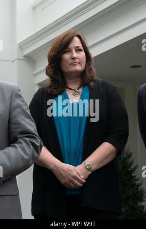 Ohio Lt. Governor John Husted takes the oath of office alongside his ...