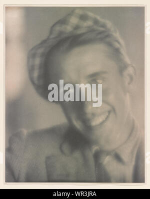 Maynard White in suit and cap Stock Photo - Alamy