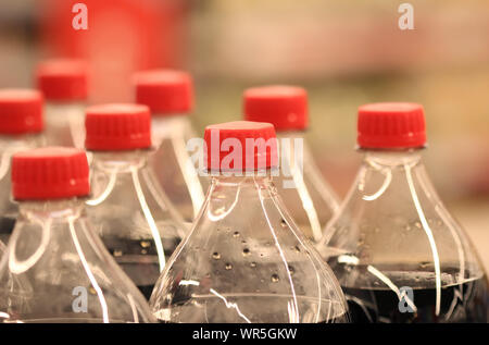 Plastic bottles with fuzzy drink Stock Photo - Alamy