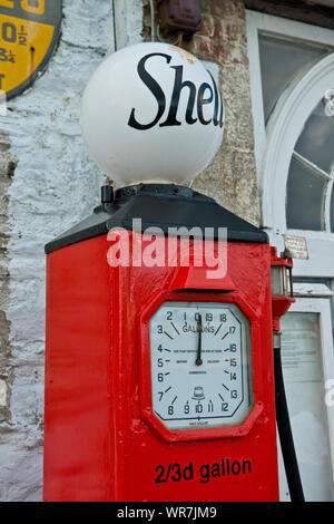 Two vintage Shell petrol pumps on a garage forecourt, Pattishall ...