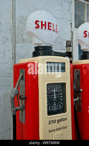 Two vintage Shell petrol pumps on a garage forecourt, Pattishall ...